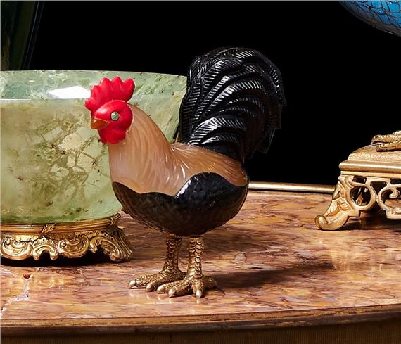 Silver | A FABERGE STYLE CARVED HARDSTONE AND SILVER GILT MODEL OF A COCKEREL | MutualArt