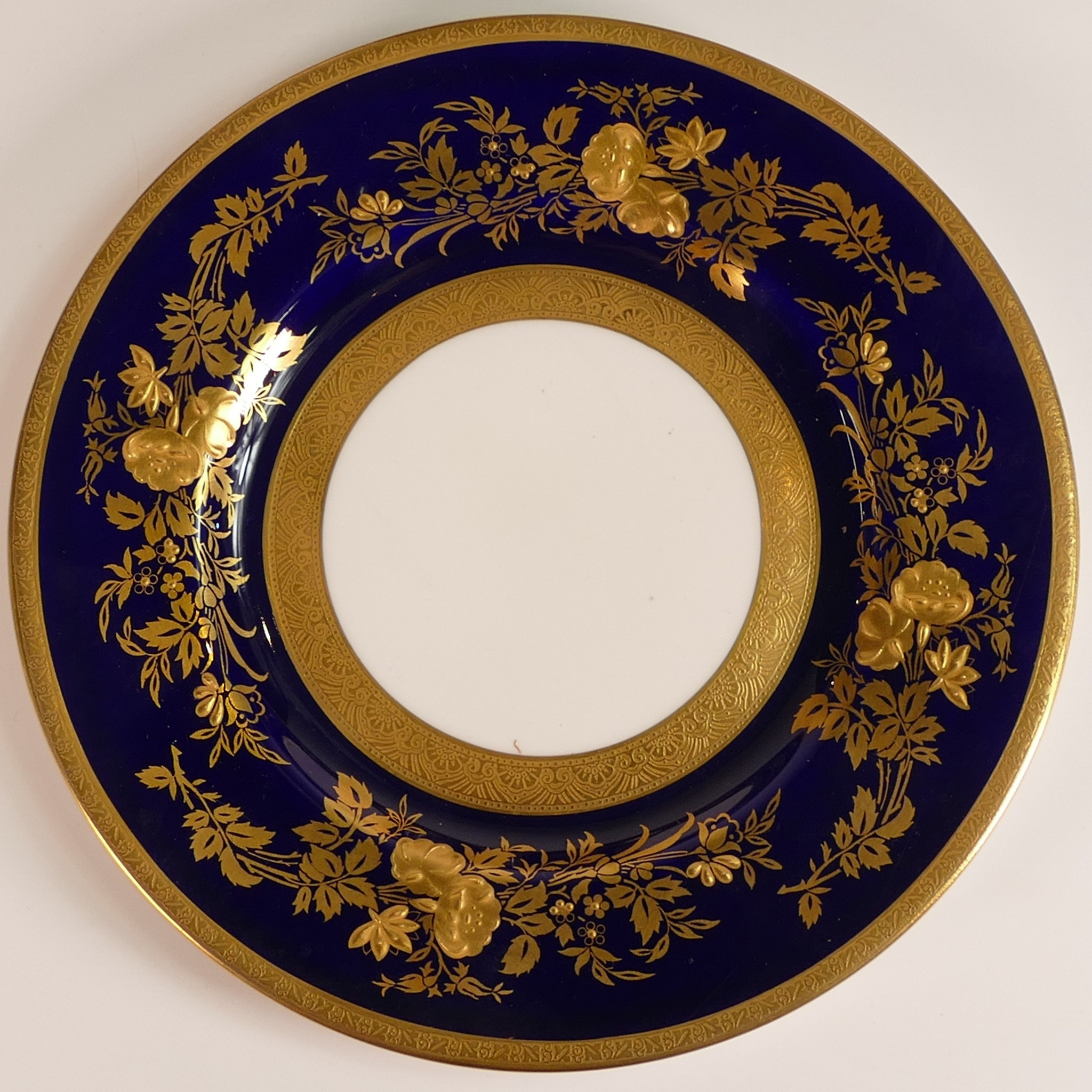 Cobalt | Minton, four heavily gilt side plates. Cobalt blue ground ...