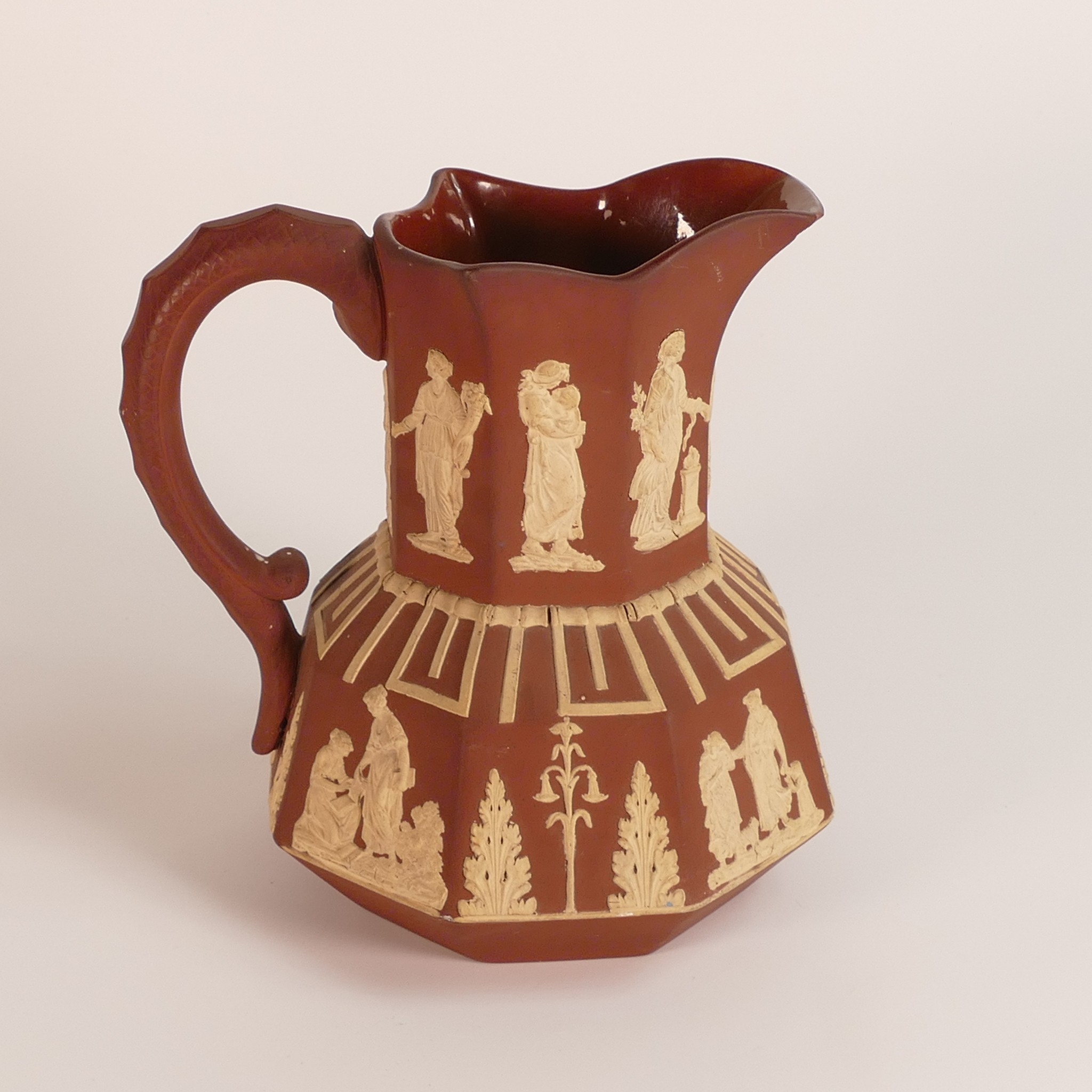 White | Early 19th century Spode redware Hydra jug. Decorated in white ...