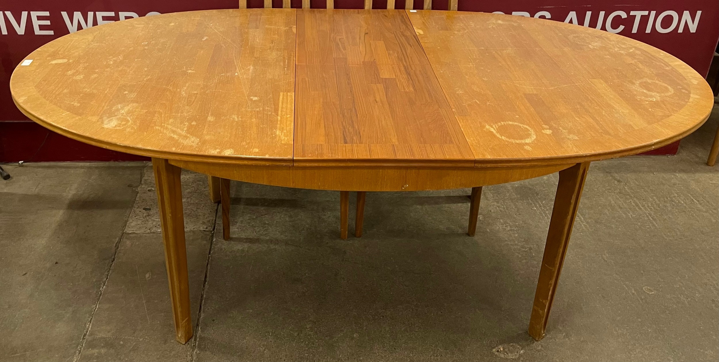 William Lawrence | A William Lawrence teak extending dining table and ...