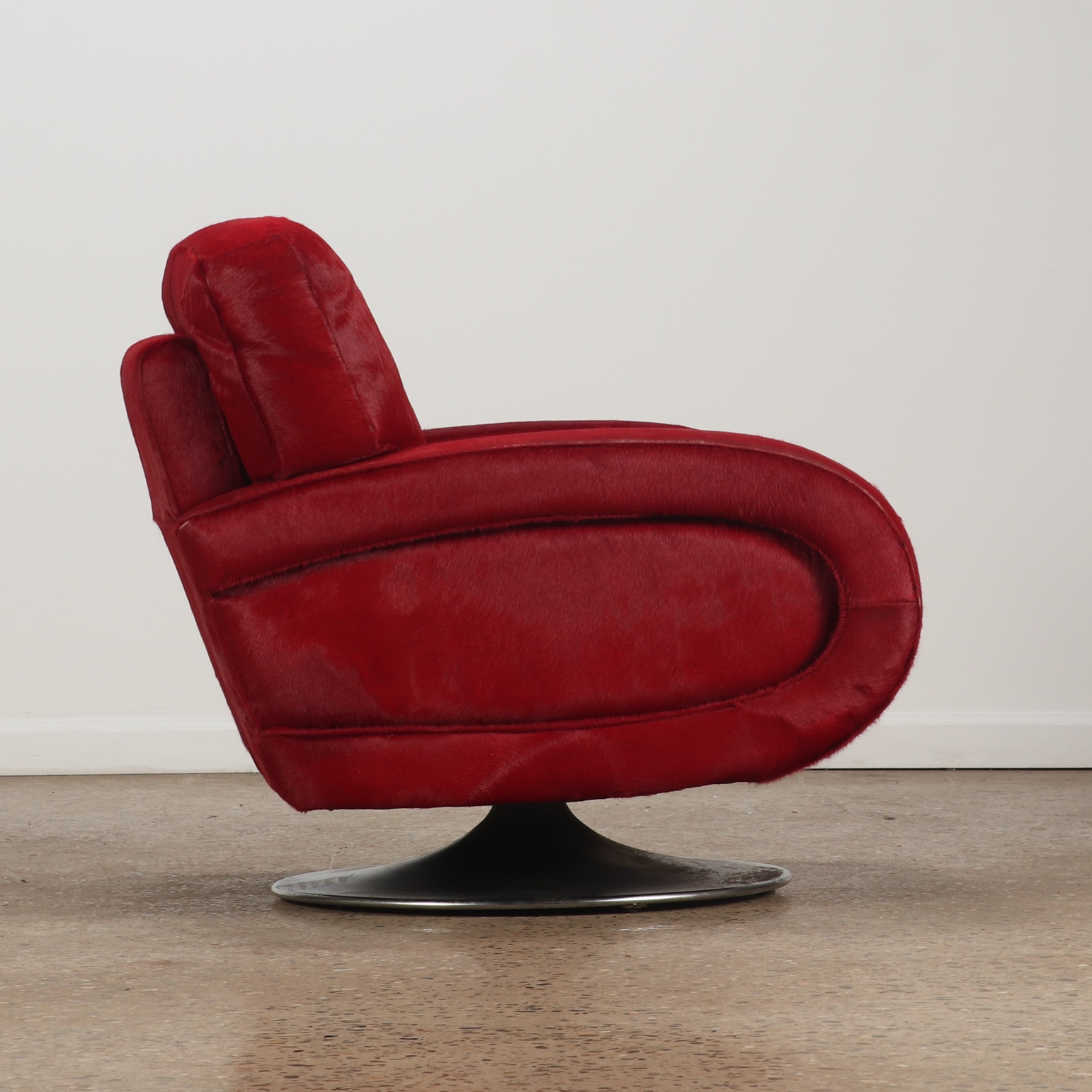 Charles Johnson Payne | Large Italian swivel chair upholstered in red ...