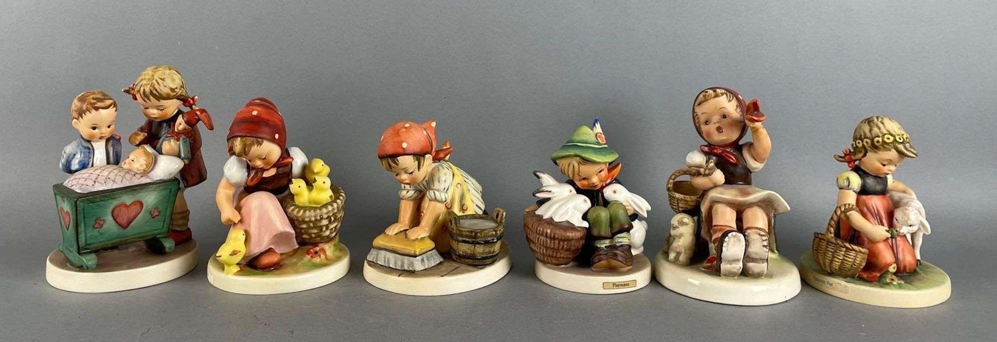 Goebel Hummel | Group of Goebel Hummel Porcelain Figurines Turn off bid ...