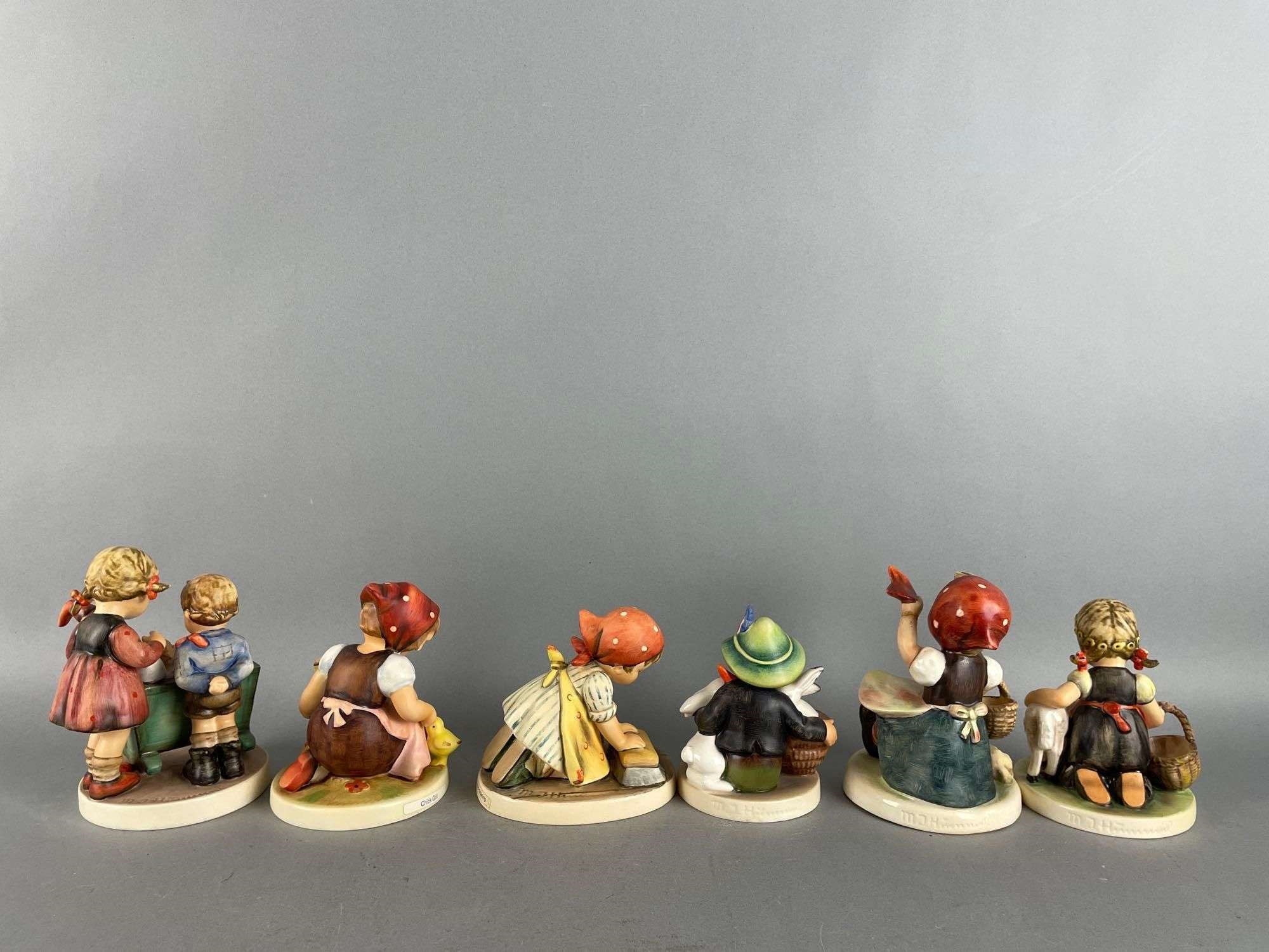 Goebel Hummel | Group of Goebel Hummel Porcelain Figurines Turn off bid ...