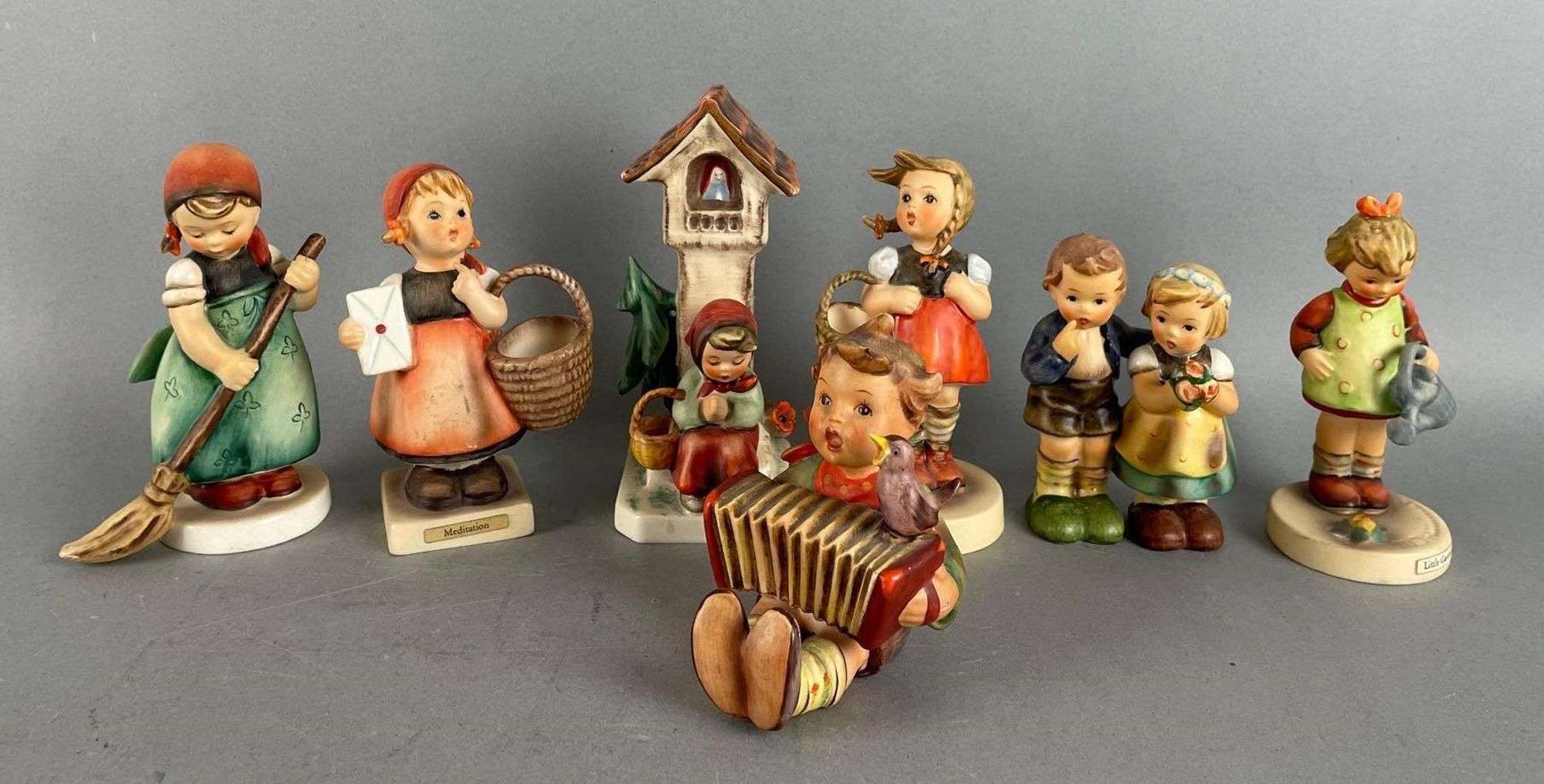Goebel Hummel | Group of Goebel Hummel Porcelain Figurines Turn off bid ...