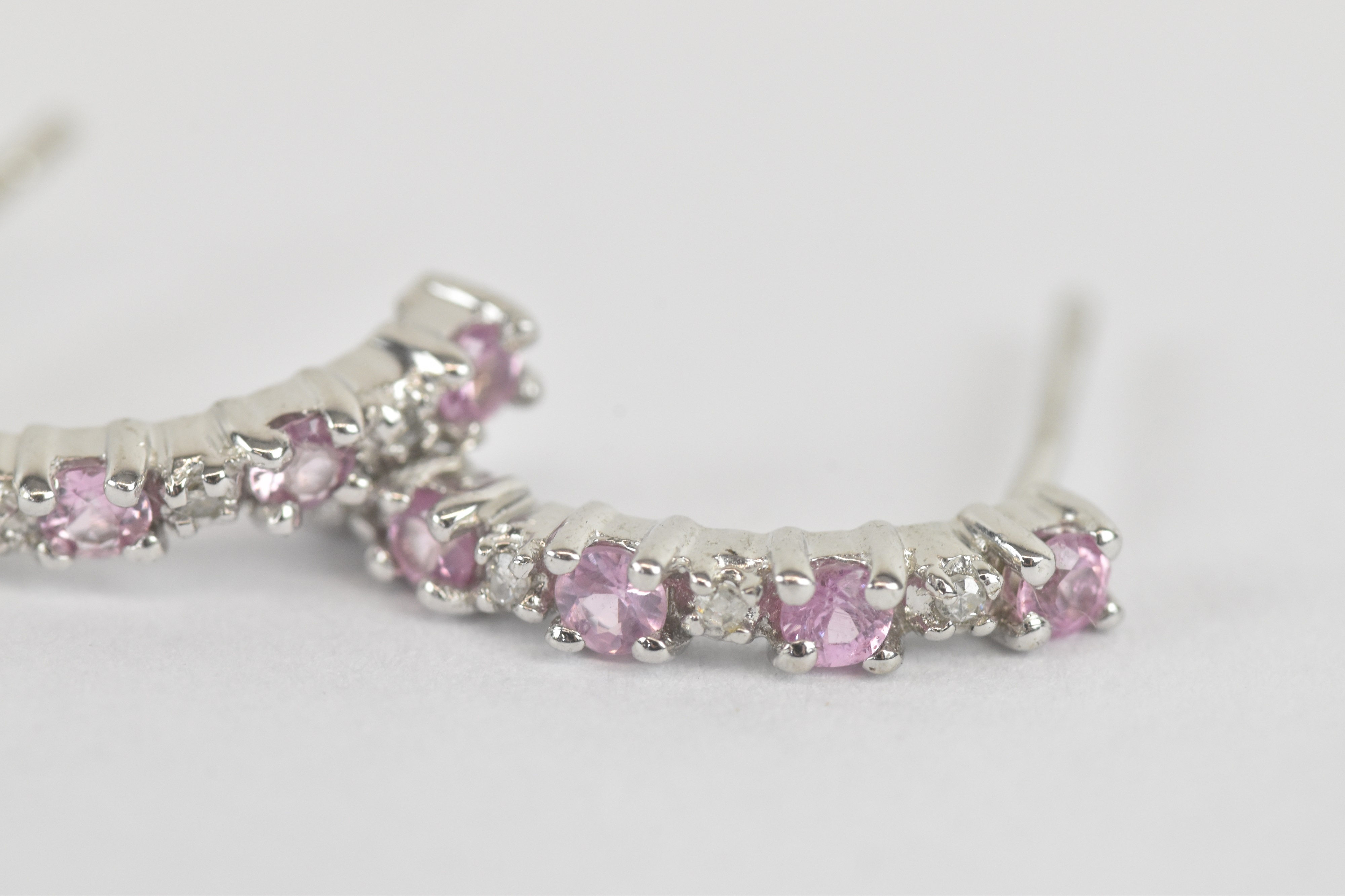 Diamond | each set with five small rubies and four small diamonds ...