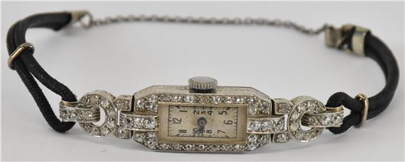 Diamond | the tank dial with Arabic numerals and outer minute track ...