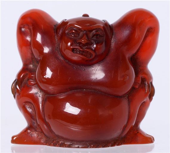 Amber | An amber netsuke of a sumo wrestler | MutualArt