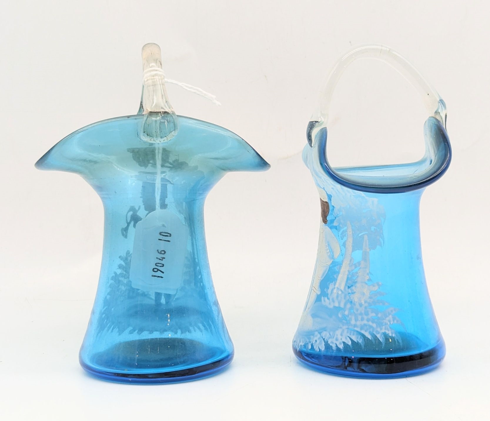 Mary Gregory | A PAIR OF MARY GREGORY BASKET VASES | MutualArt