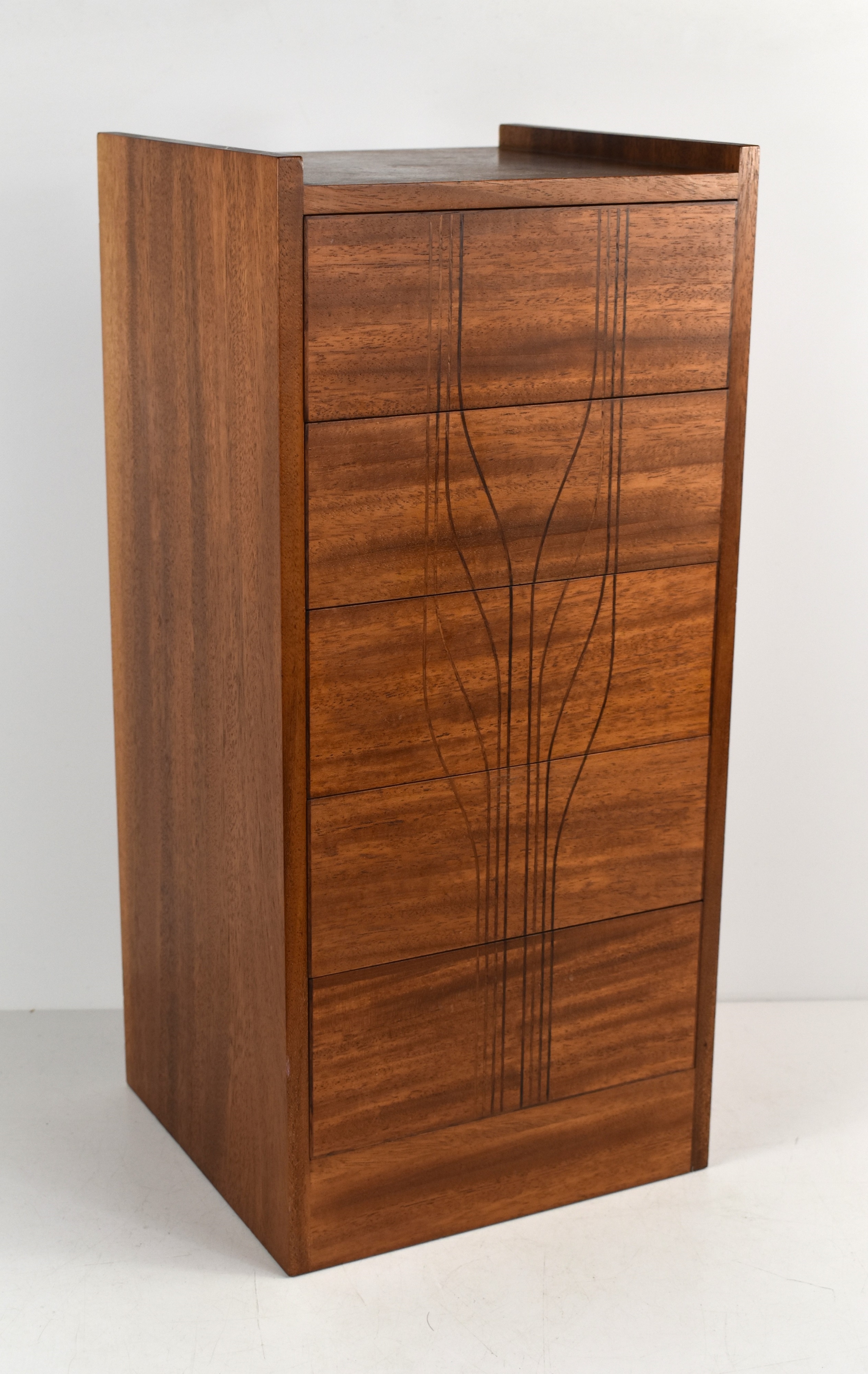 John Makepeace | Robert Ingham A miniature teak chest of five drawers ...