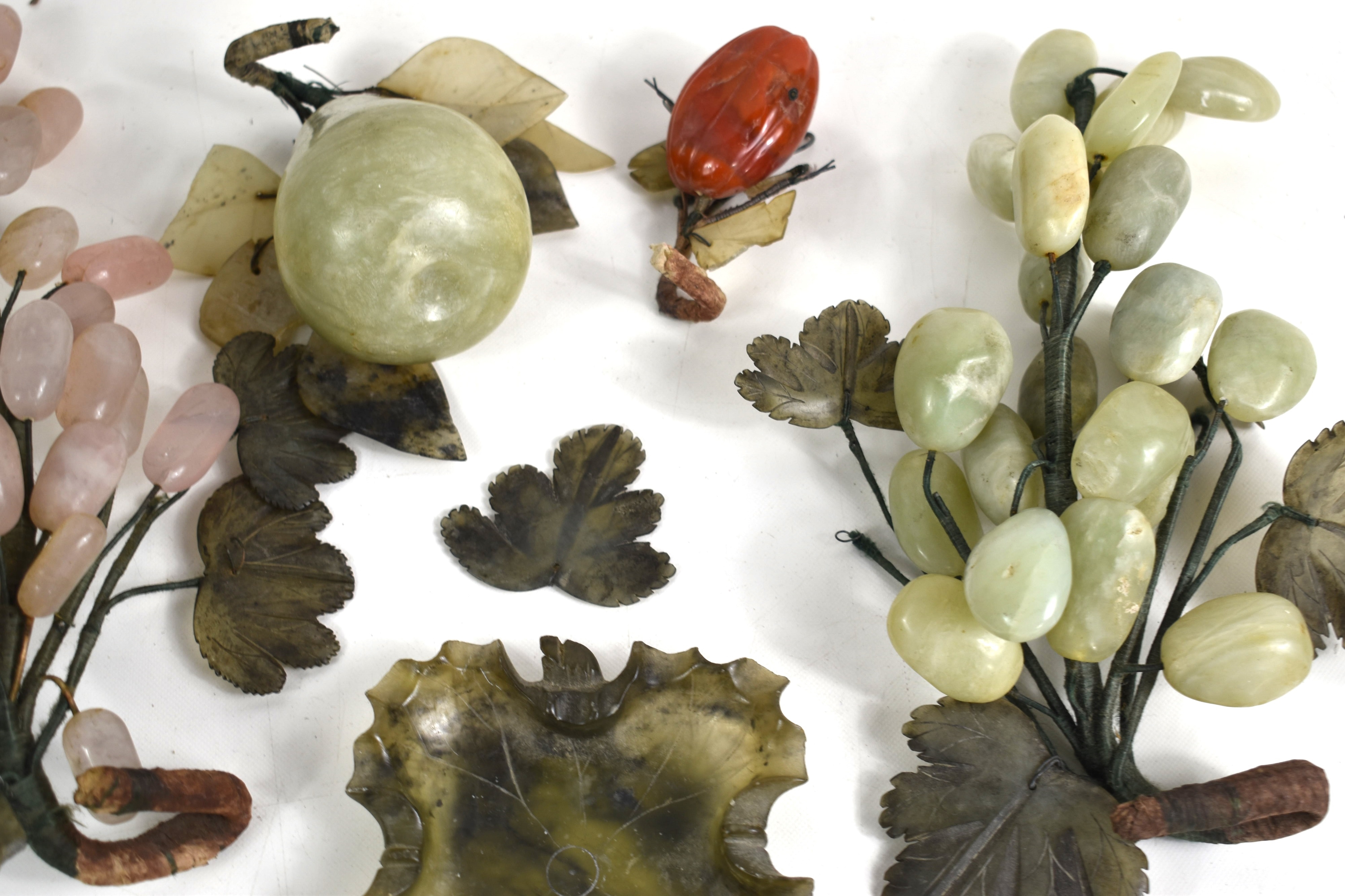 Agate | A collection of Chinese carved jade and agate fruits to include ...