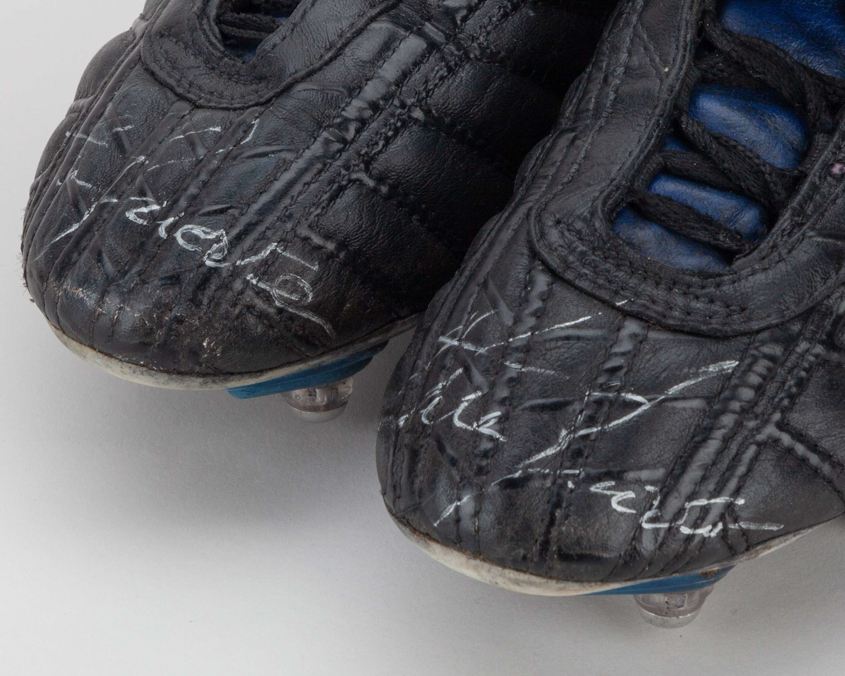 Black | Alan Shearer a pair of Umbro match worn and autographed ...