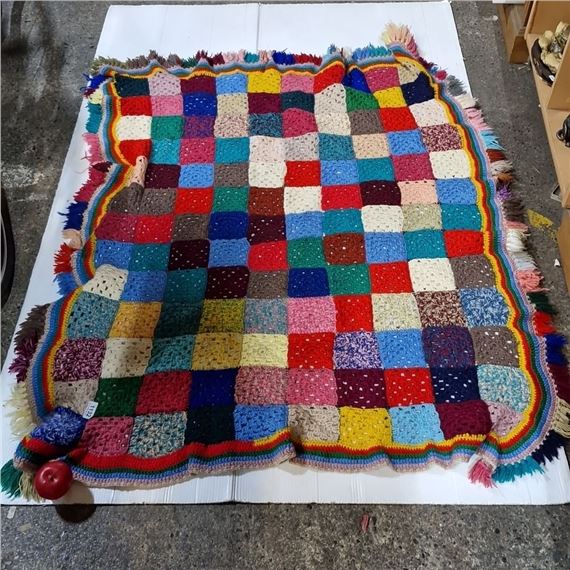 Fringe | A Multicolored crochet patchwork blanket with vibrant fringe ...