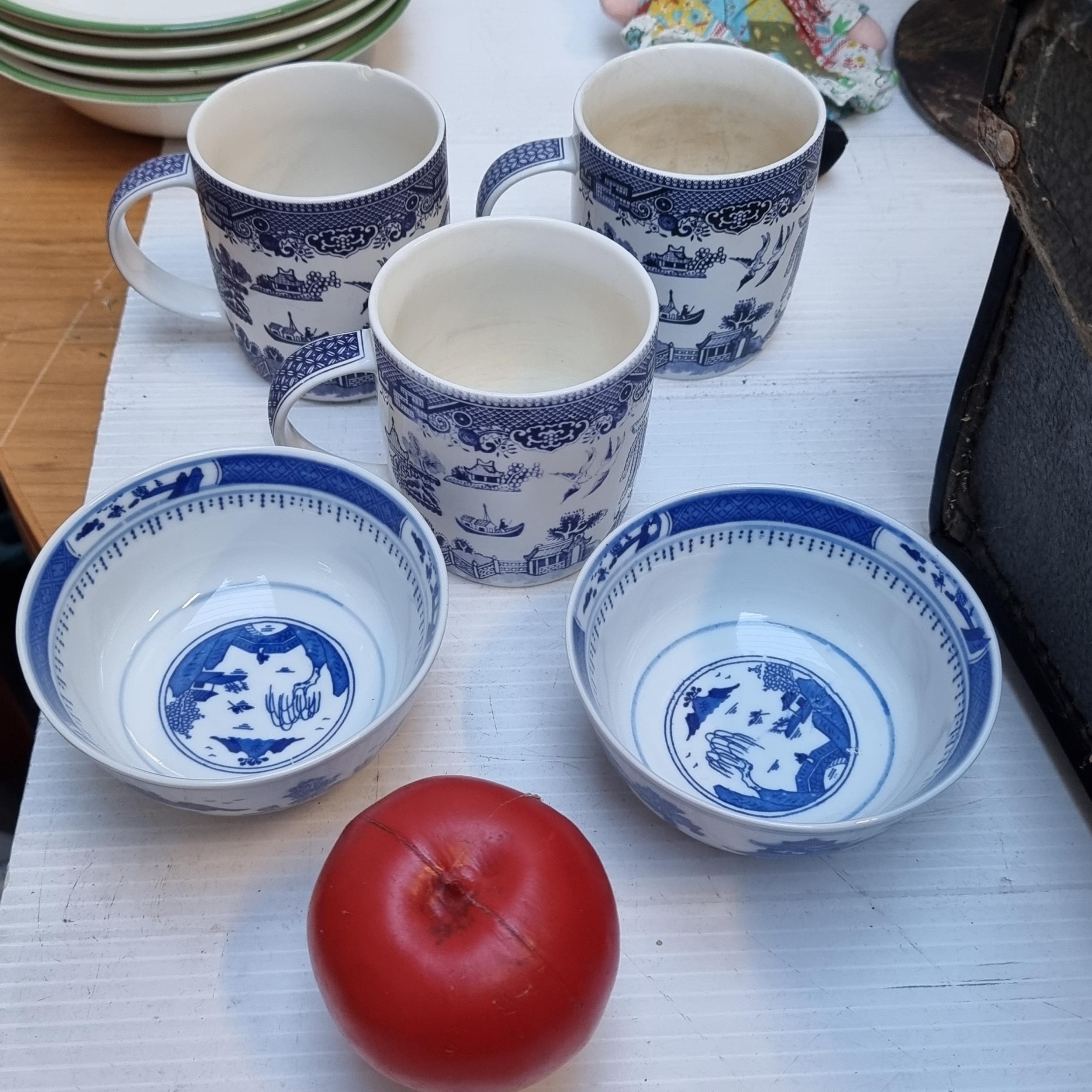 Hope K. Ritchie | Three blue and white Churchill porcelain mugs along ...
