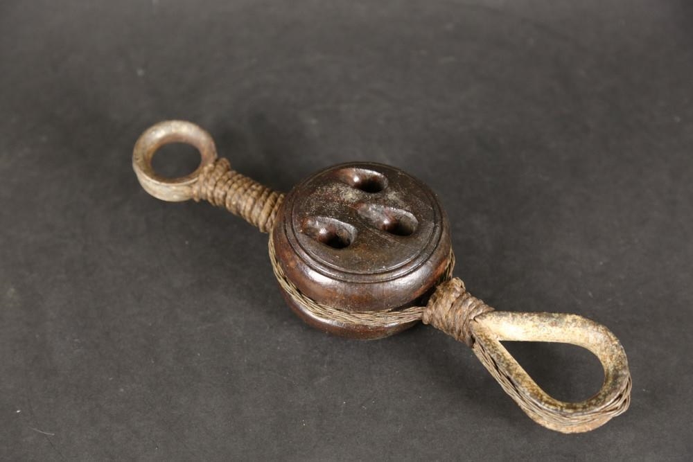 Block | An early timber dead eye block having three holes to interior ...