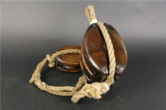 Block | An early Ships timber dead eye block attached to the lower ...