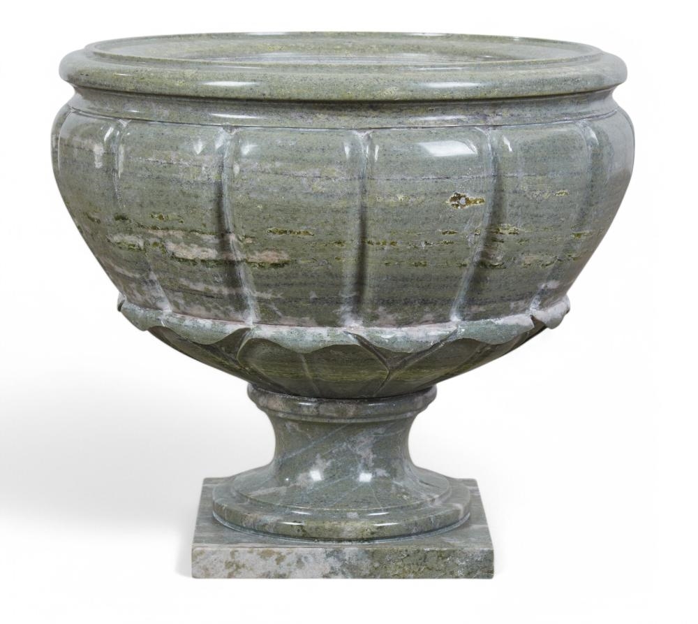 Rubbing | A pair of green stone lotus form jardinieres | MutualArt