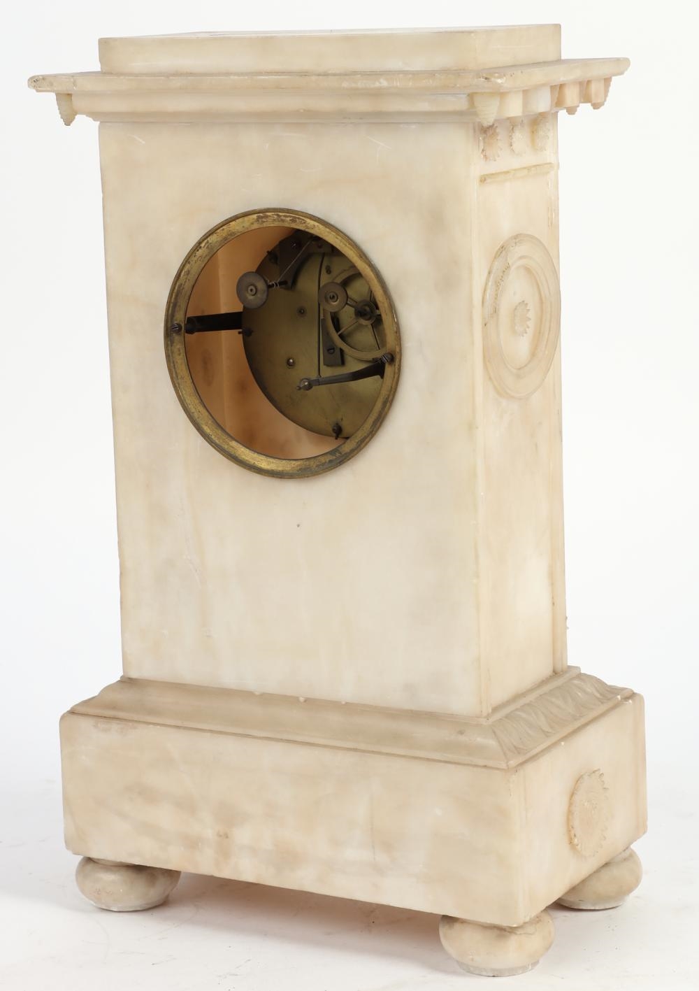 Rubbing | A French alabaster mantel clock | MutualArt