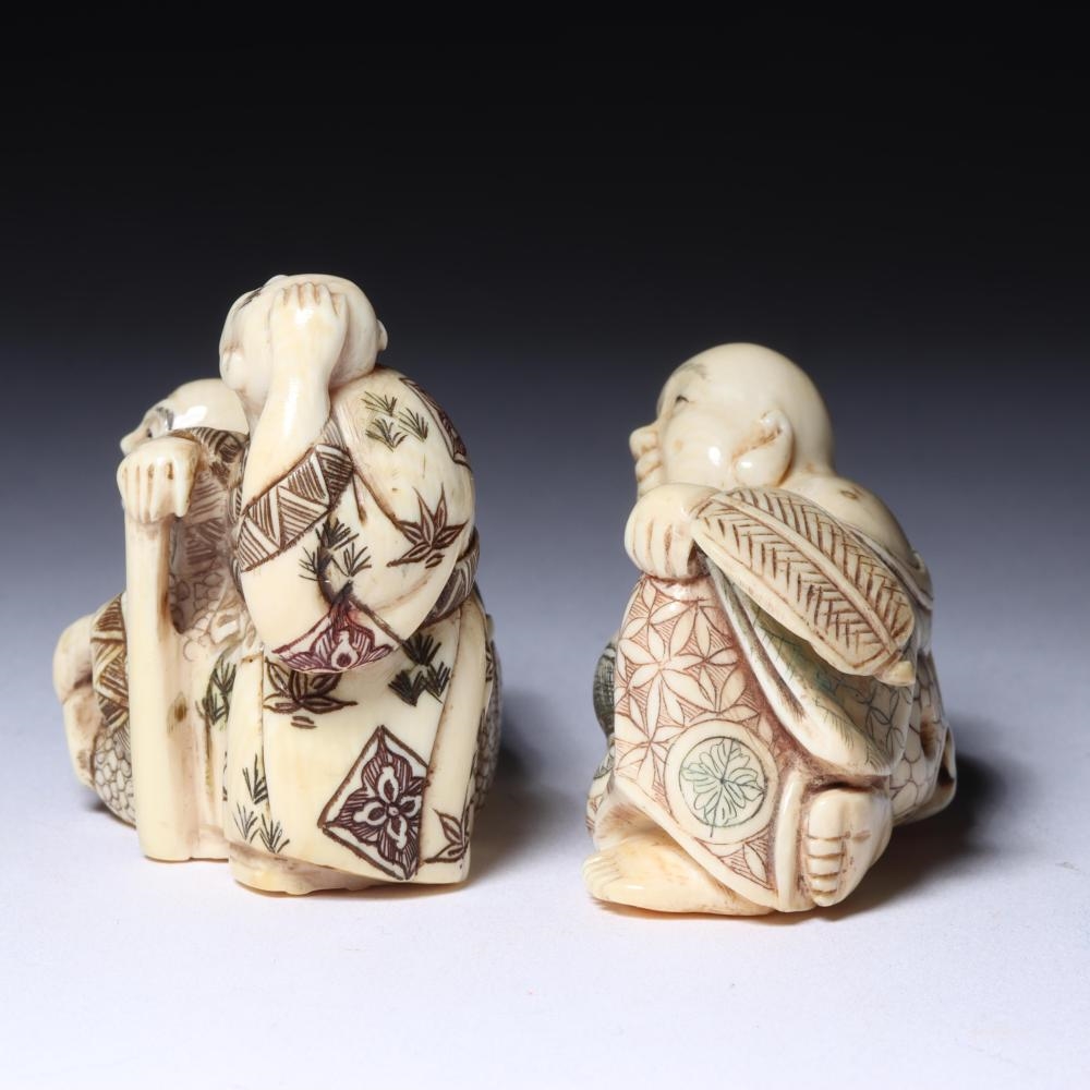 Stick | Japanese carved figural netsuke 2pc polychrome group: seated ...
