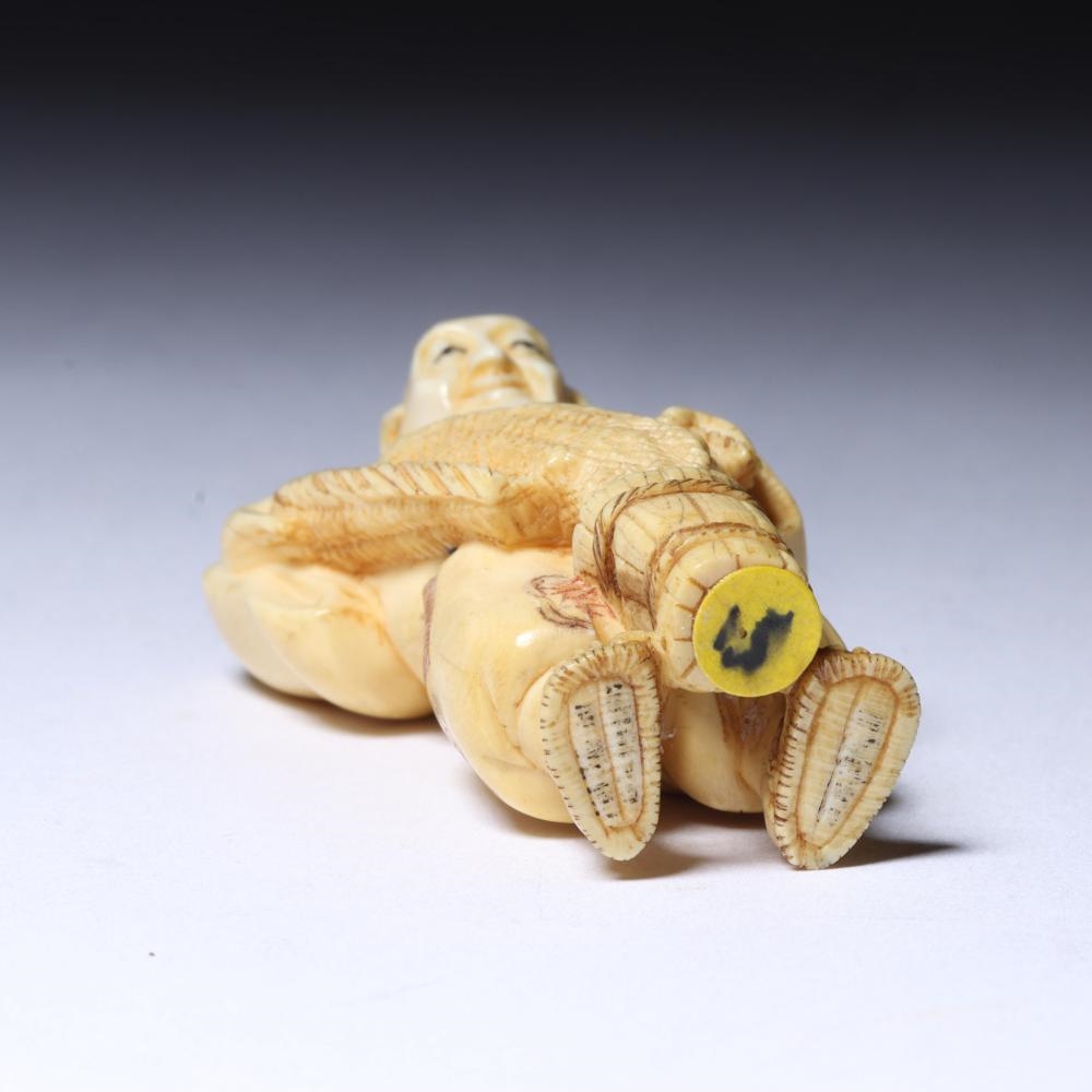 White | Japanese carved bone figural netsuke: elder man | MutualArt