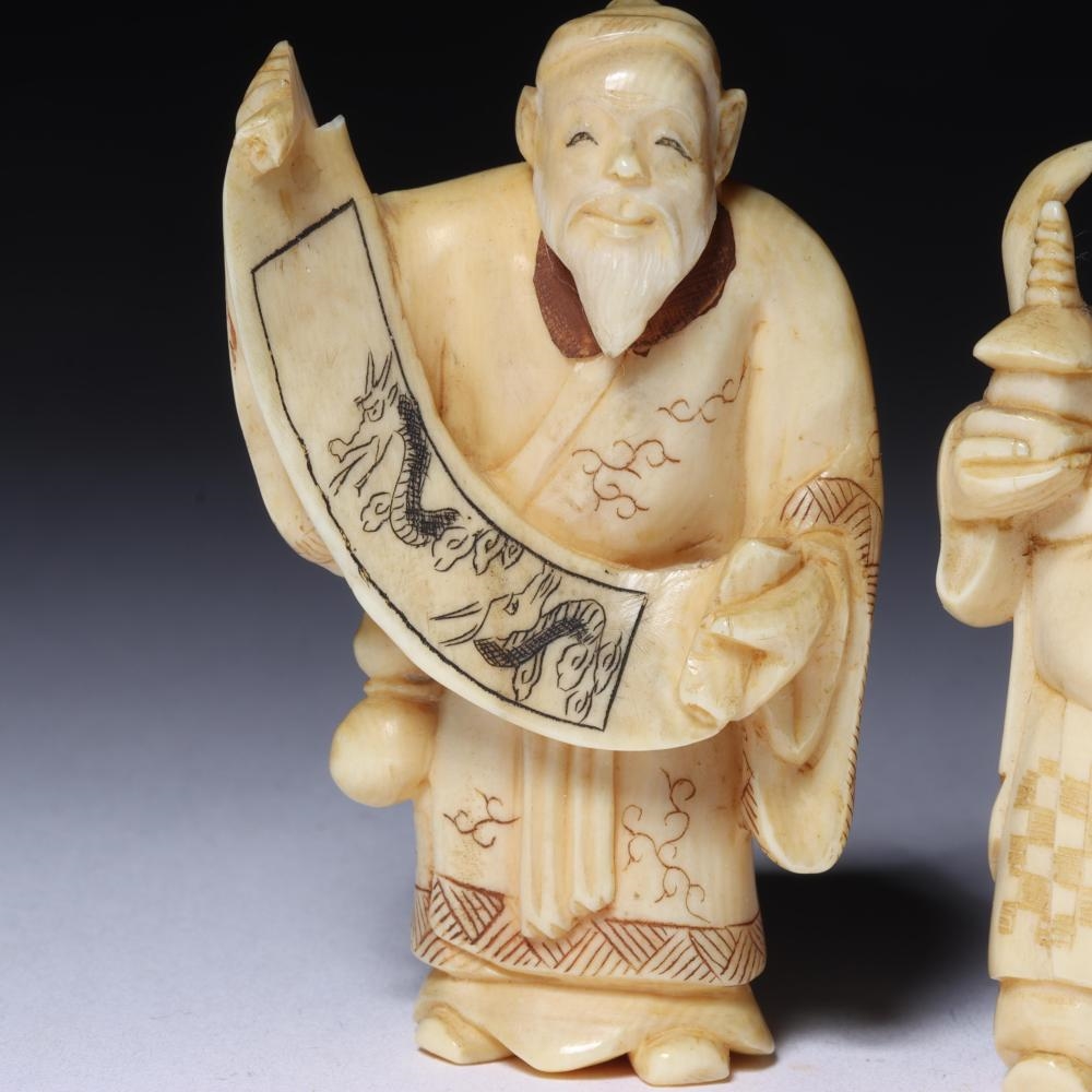 Dragon | Pair of Japanese carved figural netsuke: elder man scholar ...