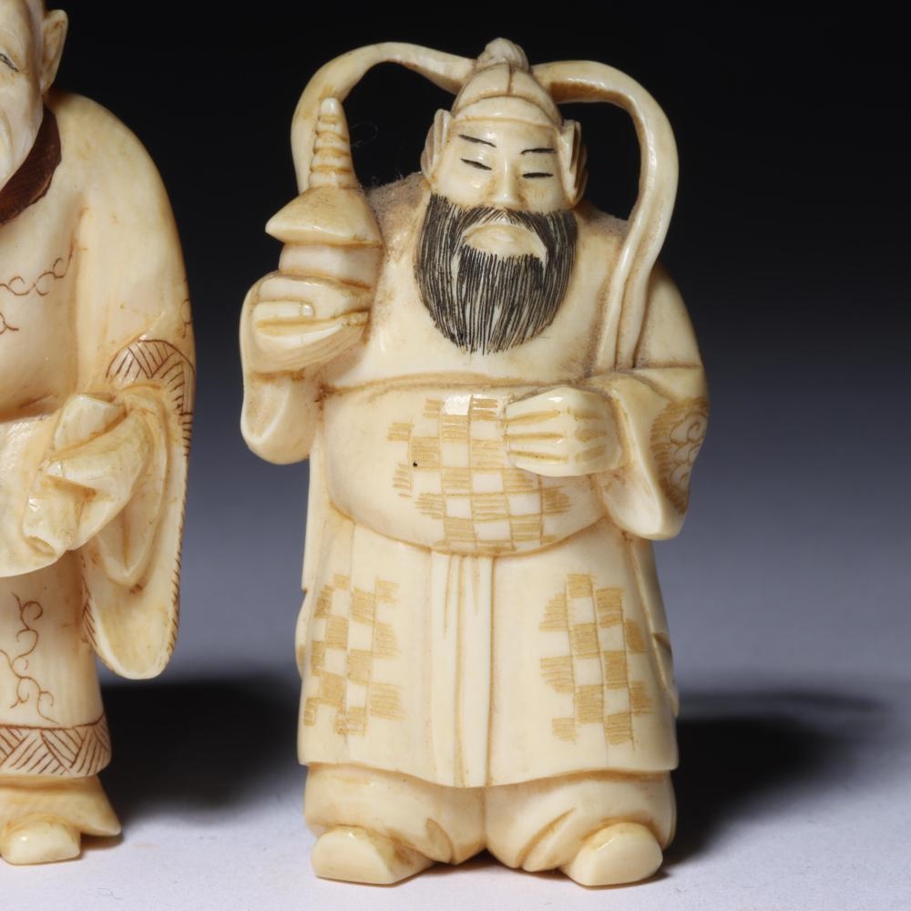 Dragon | Pair of Japanese carved figural netsuke: elder man scholar ...
