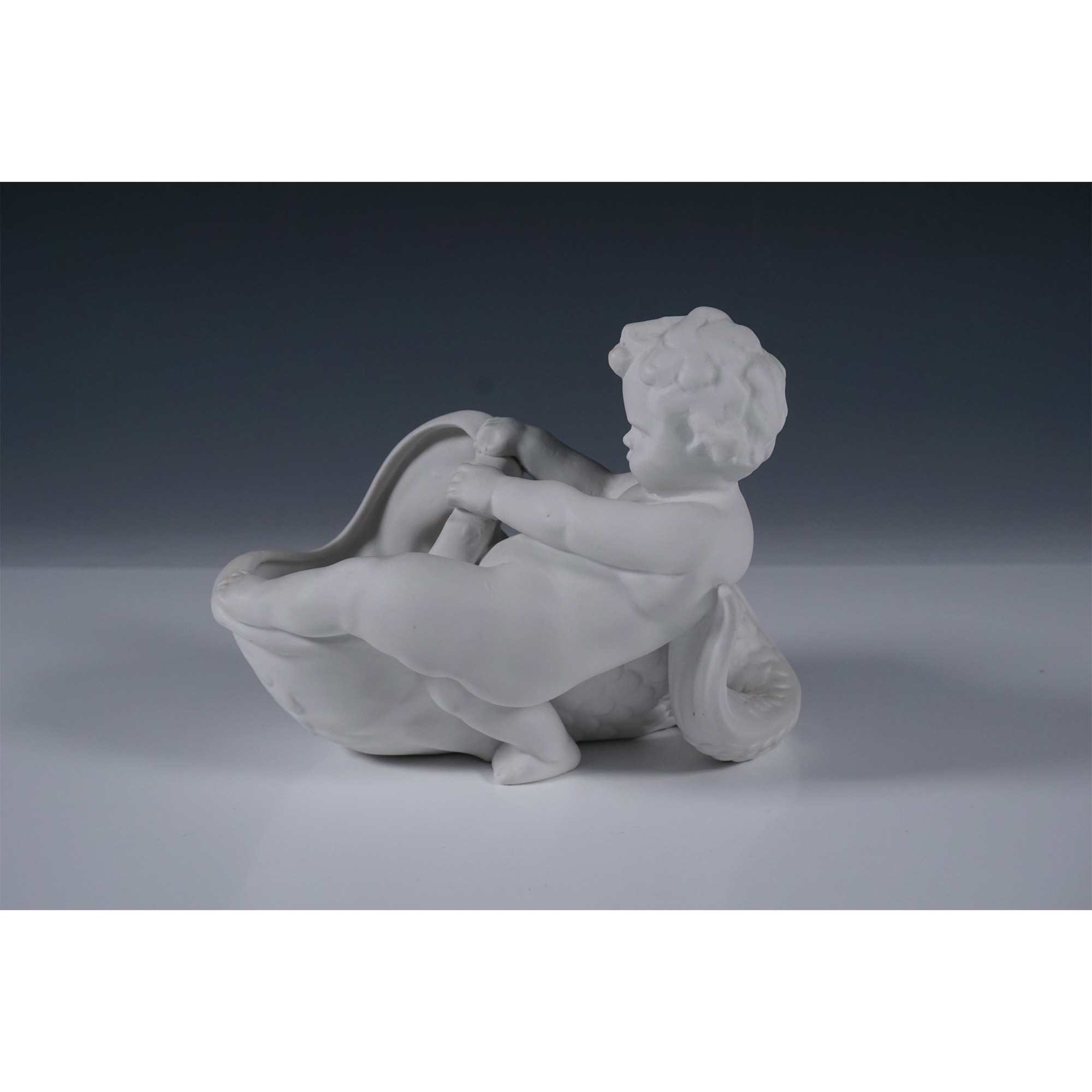 White | Bisque Porcelain Cherub with Mythological Sea Creature Vase ...