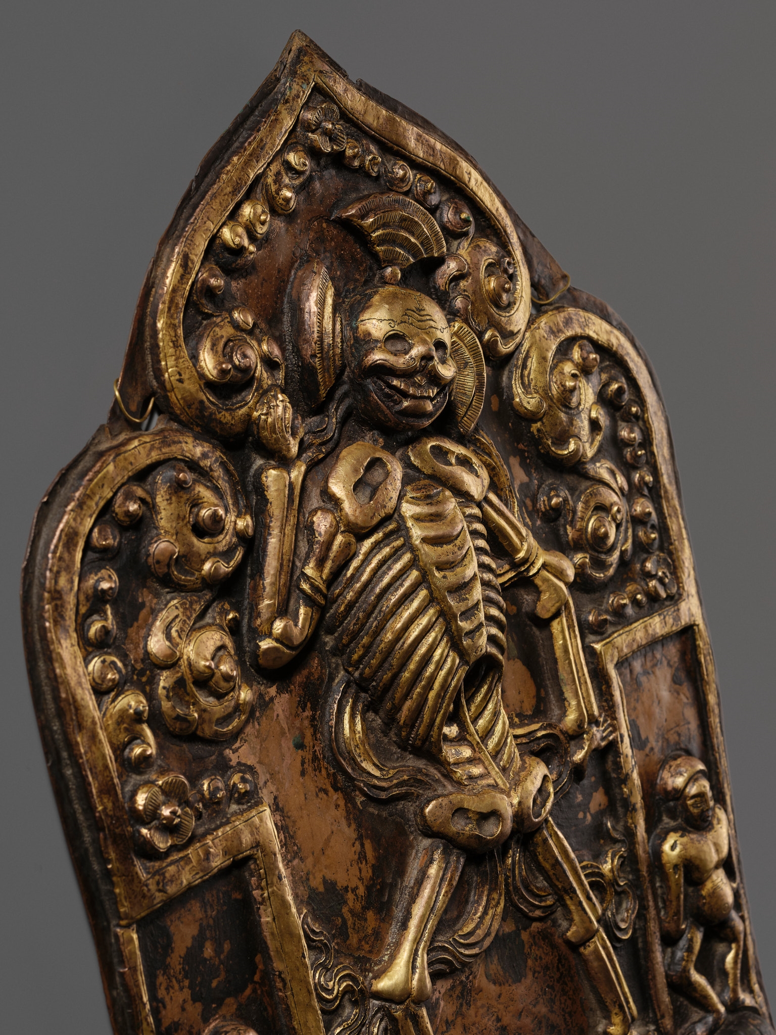 Tibetan School, 18th Century | A GILT COPPER-ALLOY REPOUSSÉ PLAQUE ...