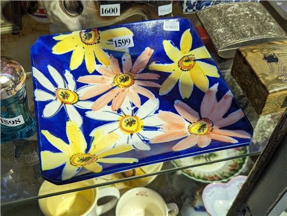 Helen Taylor | A glazed art pottery plate with flowers on blue ground ...