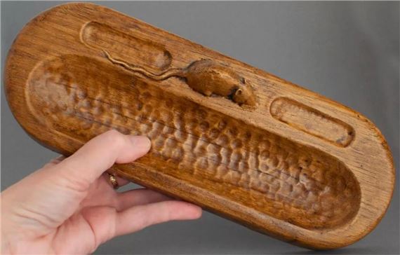 Robert Thompson | Elongated oblong form with large central carved well ...