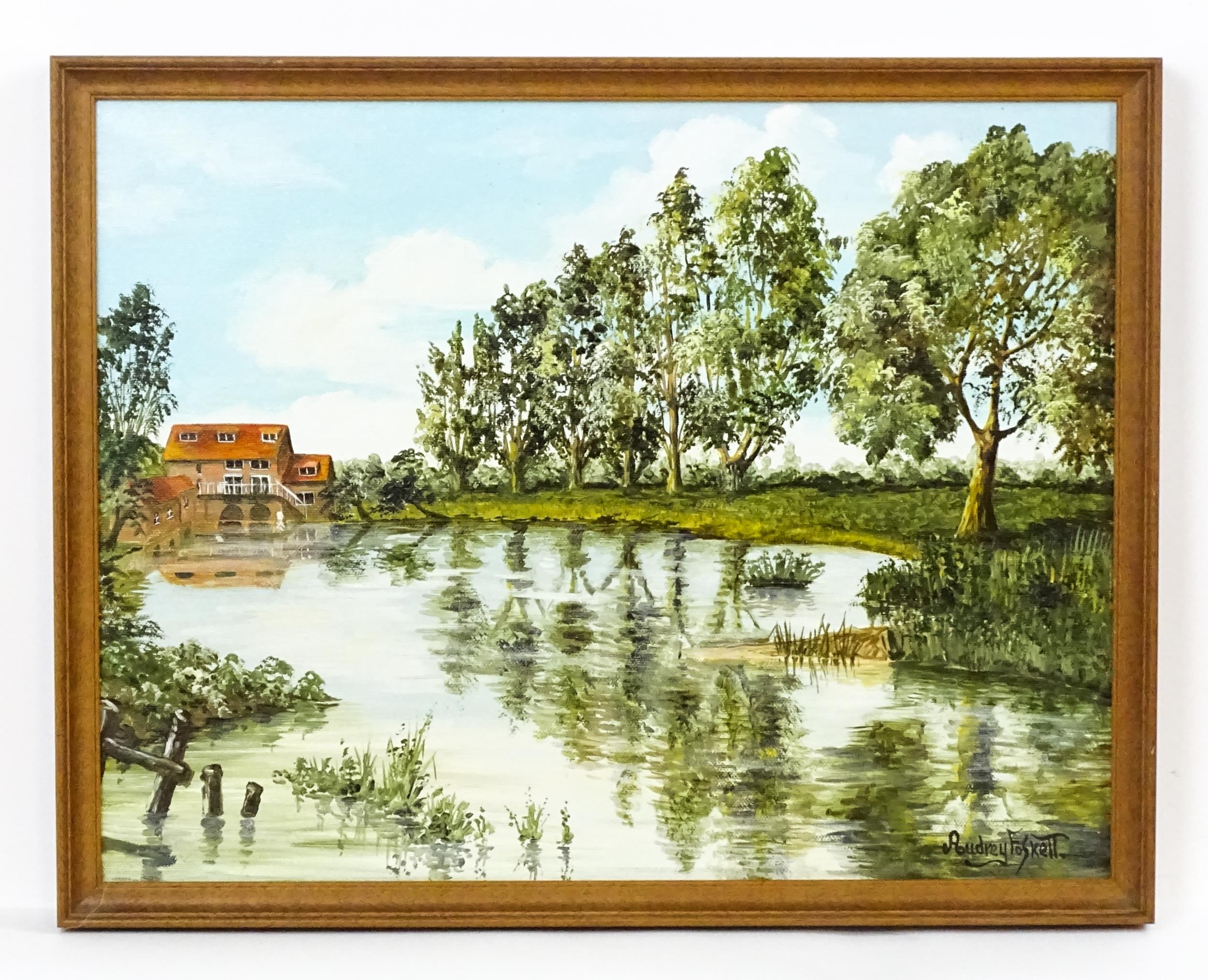 Audrey Foskett | A river lined by a row of trees with building beyond ...