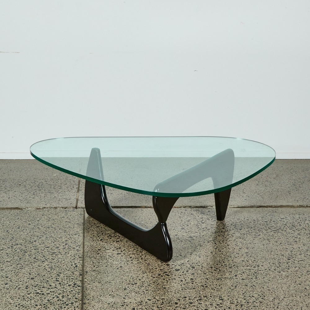 Isamu Noguchi | An Isamu Noguchi style Coffee Table with Black Base ...