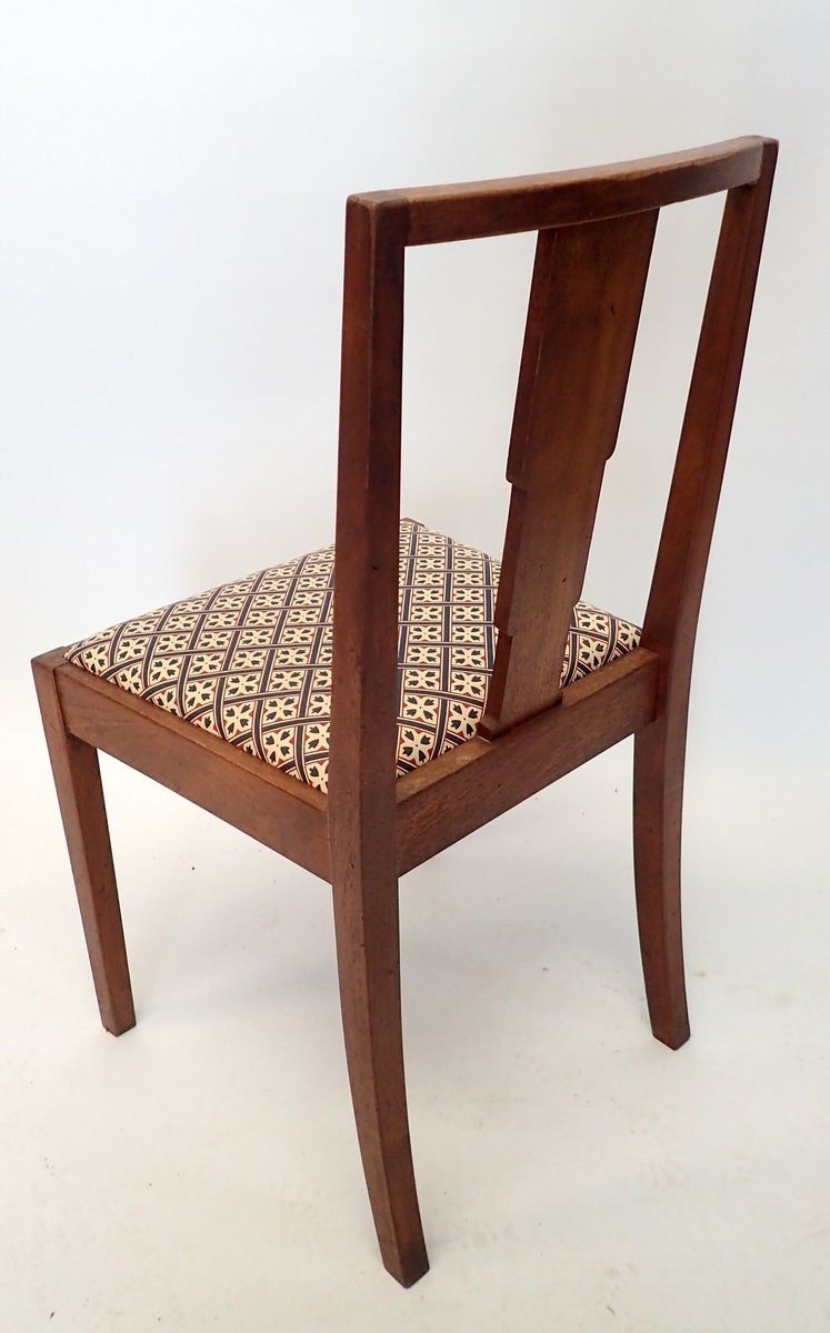 Gordon Russell | A set of four 20th century walnut dining chairs after ...