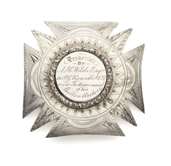 Rowell | of white-metal, formed in the shape of a cross, border ...