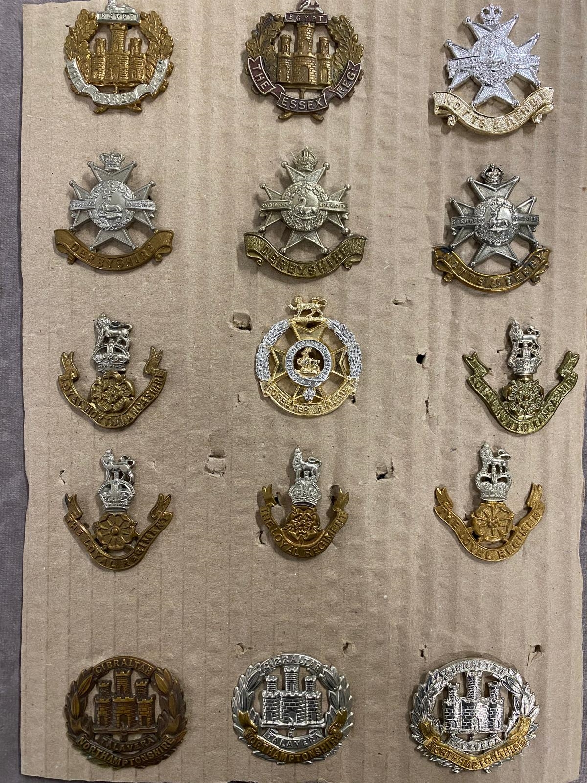 DeVon Stanfield | A collection of mixed 15 cap badges from | MutualArt