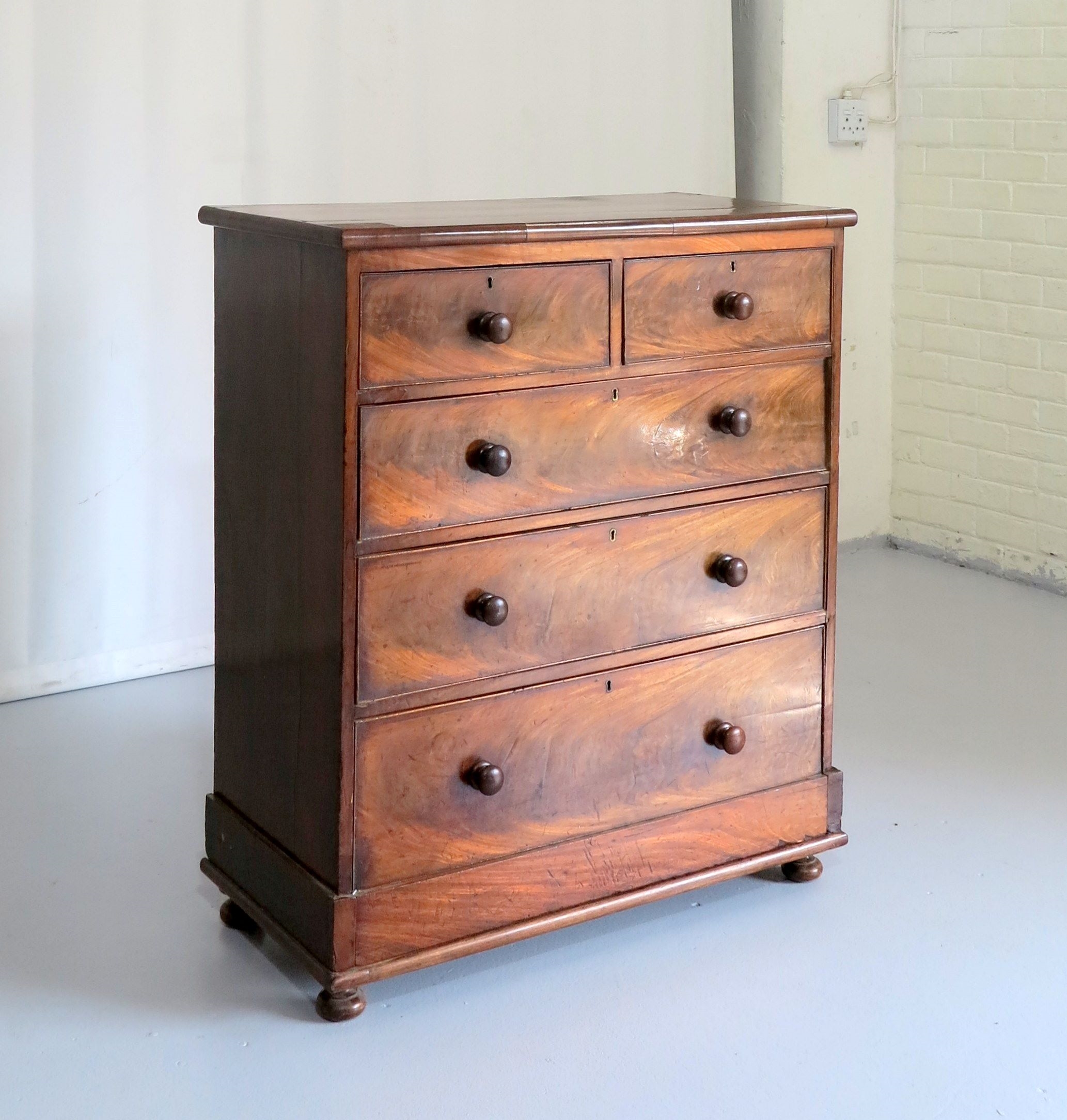 FLAME | VICTORIAN FLAME MAHOGANY CHEST OF DRAWERS | MutualArt