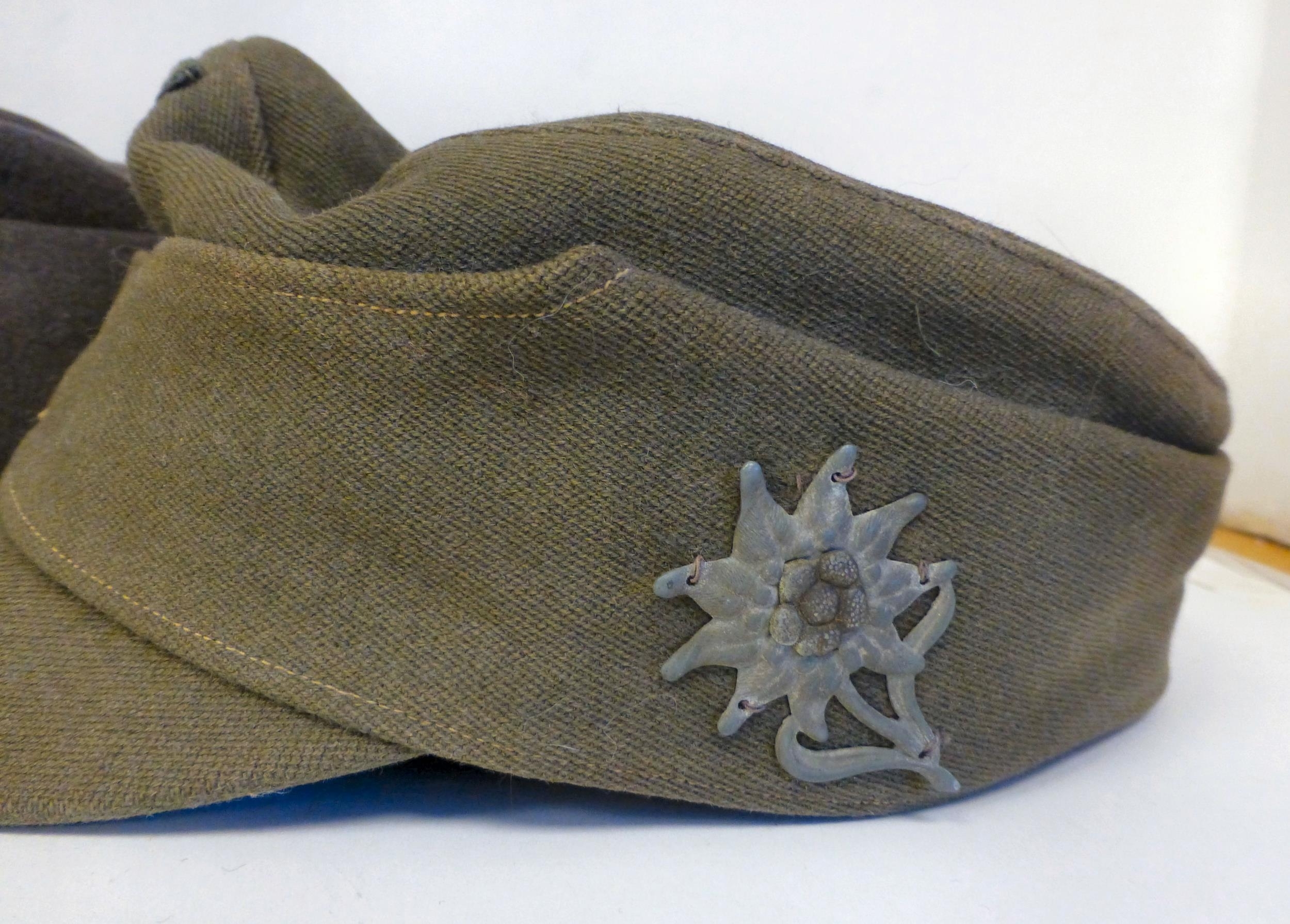 Similar | Three similar German World War II peaked ski caps | MutualArt