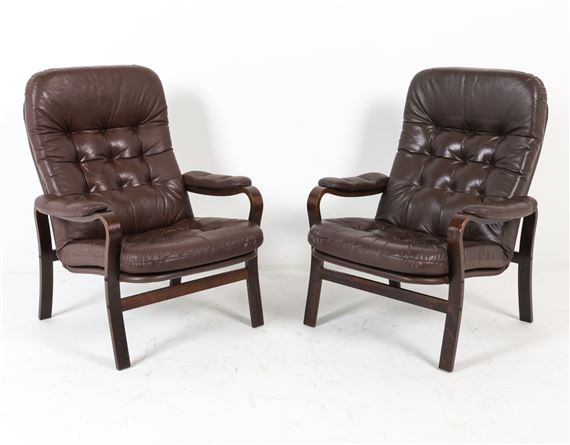 Rubbing | PAIR SCANDINAVIAN LEATHER LOUNGE CHAIRS C. 1970S | MutualArt