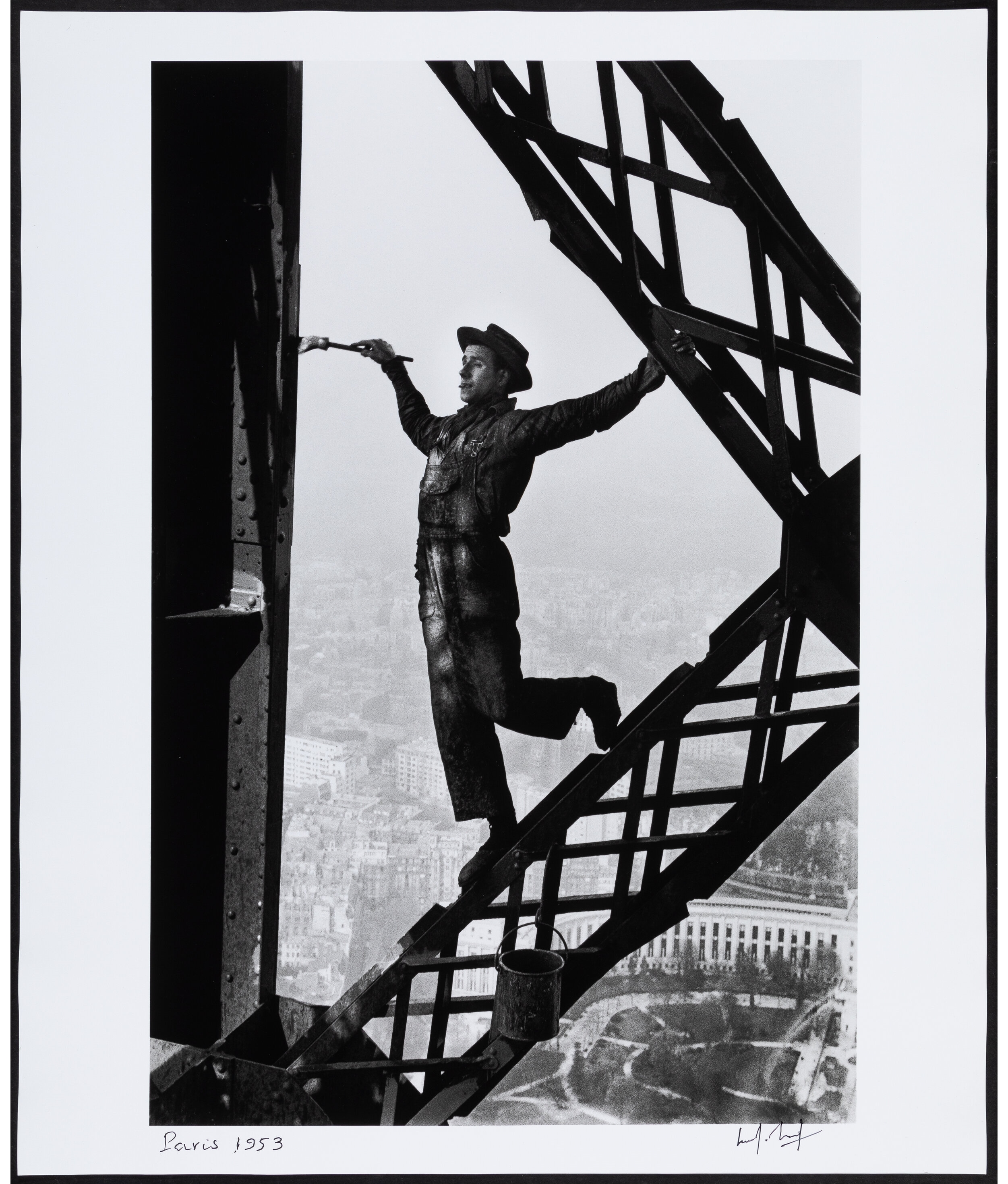 Marc Riboud | The Painter of the Eiffel Tower, Paris (1953) | MutualArt