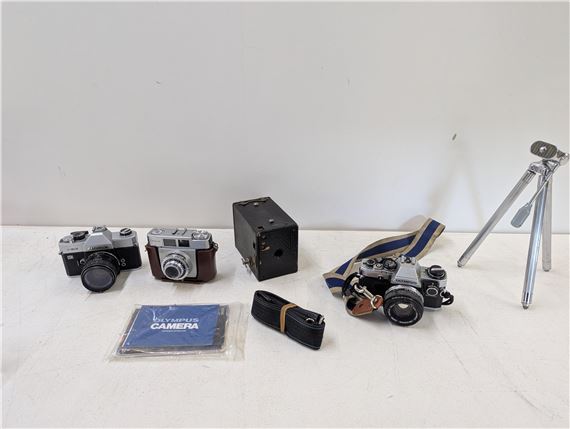 Betty V. Devonald | A group of vintage cameras to include an Olympus OM ...