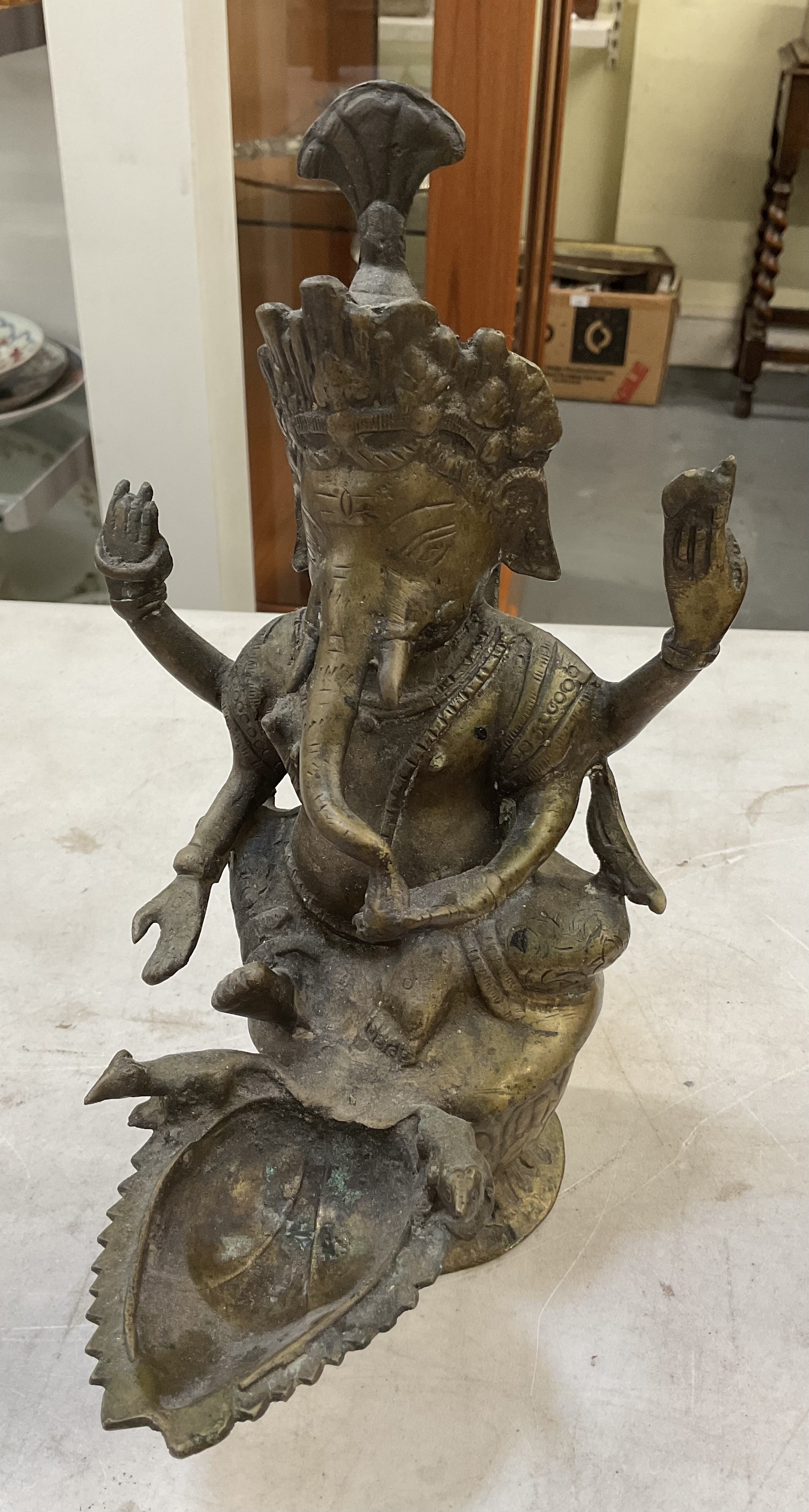 Ganesha | a pair of modern Indian brass Diya style oil lamps | MutualArt