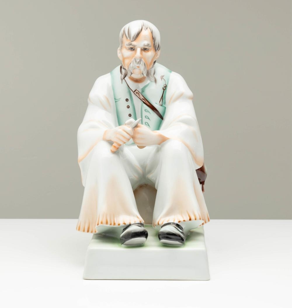 Zsolnay Ceramic Factory | A Zsolnay porcelain figure of wood carver (H ...