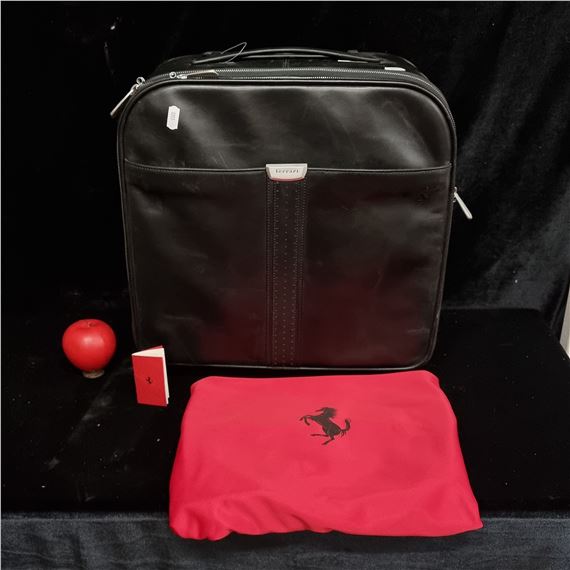 Ferrari | Star lot :An as new with tags tumbled Ferrari suitcase with ...