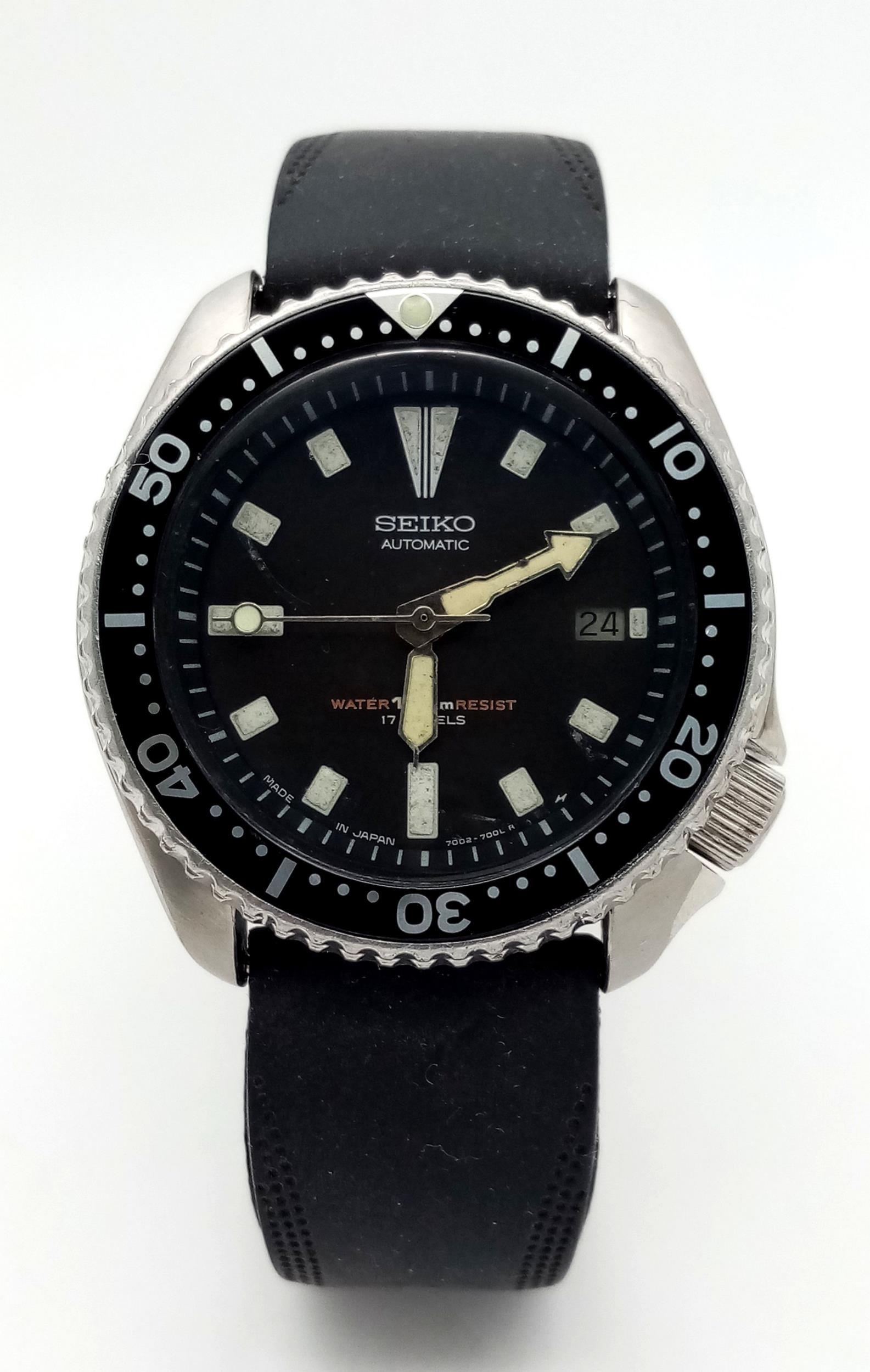 Divers | A SEIKO AUTOMATIC DIVERS WITH DATE BOX AND | MutualArt