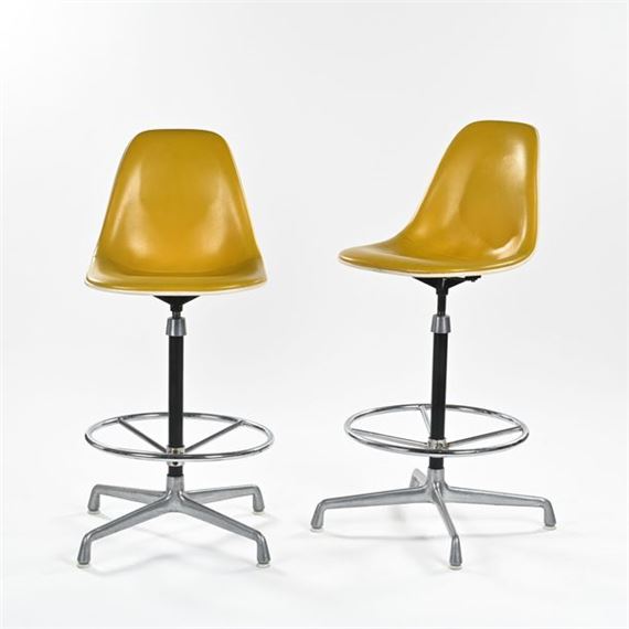 Charles & Ray Eames | Pair of bar stools in brick-orange fiberglass ...
