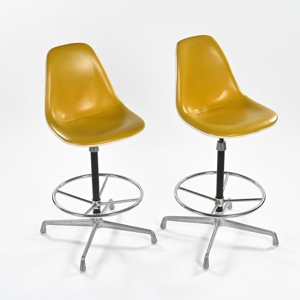Charles & Ray Eames | Pair of bar stools in brick-orange fiberglass ...