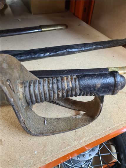 Blade | Old sword having black painted scabbard, the blade marked 'S ...