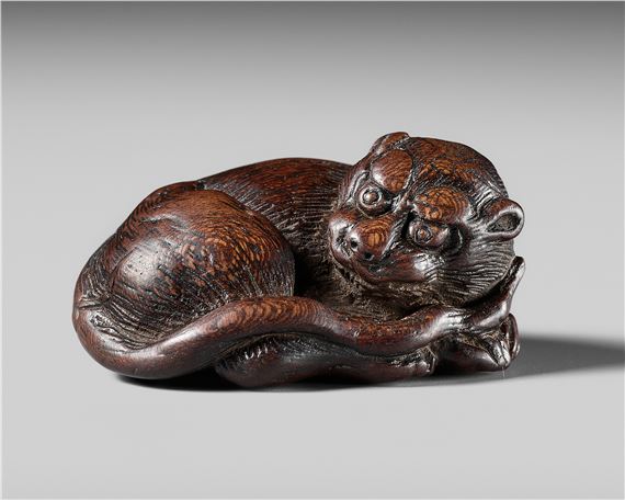 Tametaka | A SUPERB WOOD NETSUKE OF A RECUMBENT TIGER, ATTRIBUTED TO ...