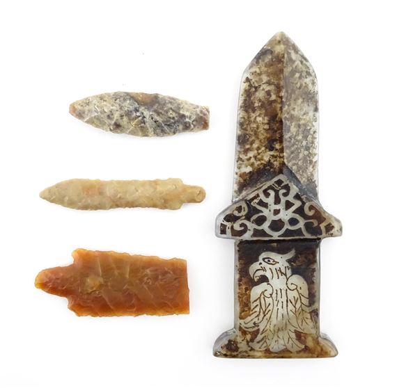 Unknown | Three assorted carved flint arrow heads. Together with an Or ...
