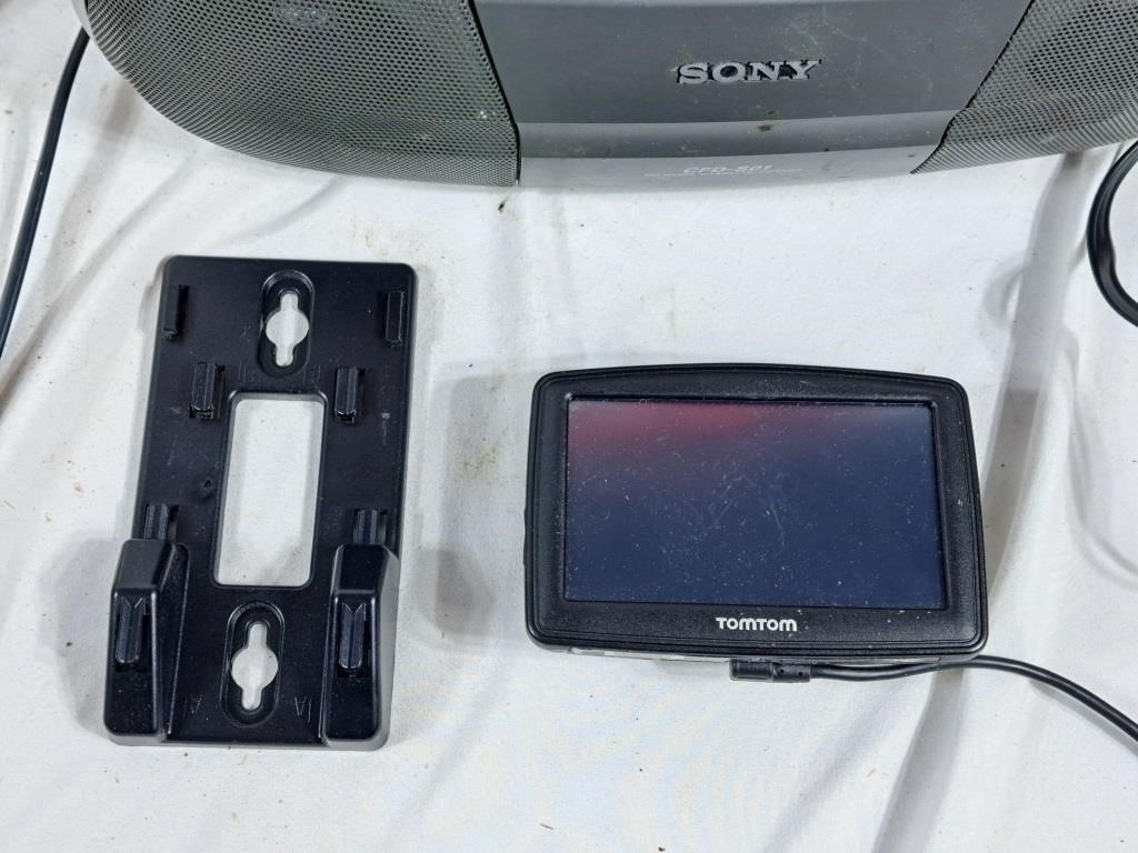 TomTom | Vtech phone, Tomtom GPS, and Sony radio | MutualArt