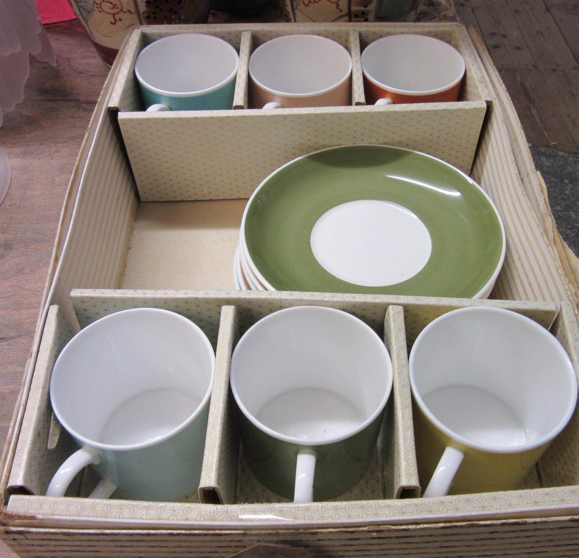 Susie Cooper | BOXED SET OF SUSIE COOPER CANS AND SAUCERS | MutualArt